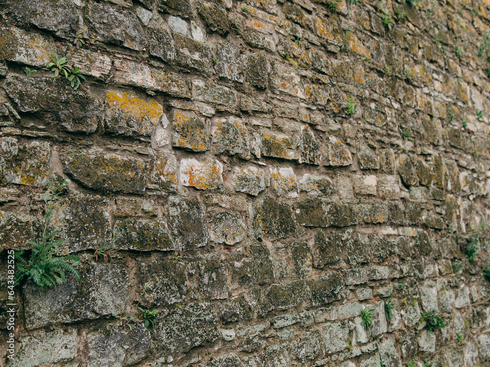 An old stone medieval wall, a natural background, a replica of the ...