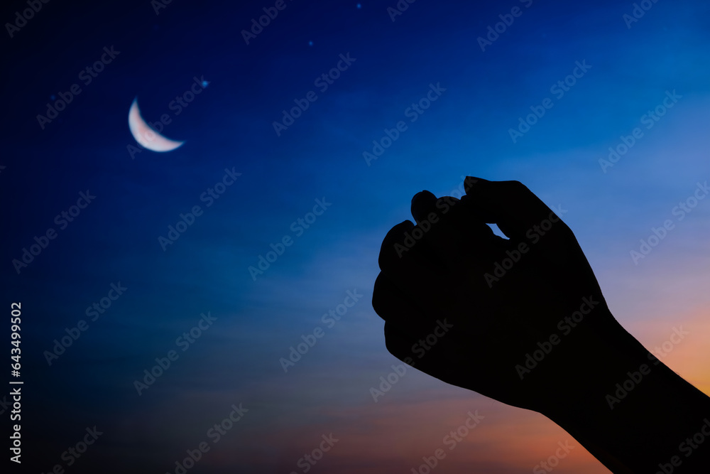 Hands of an Islamic man asking for blessings from the gods. Background ...