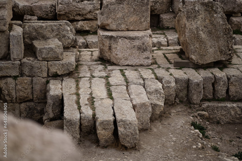 Large marble blocks remain in place at the ancient ruins of a Roman ...