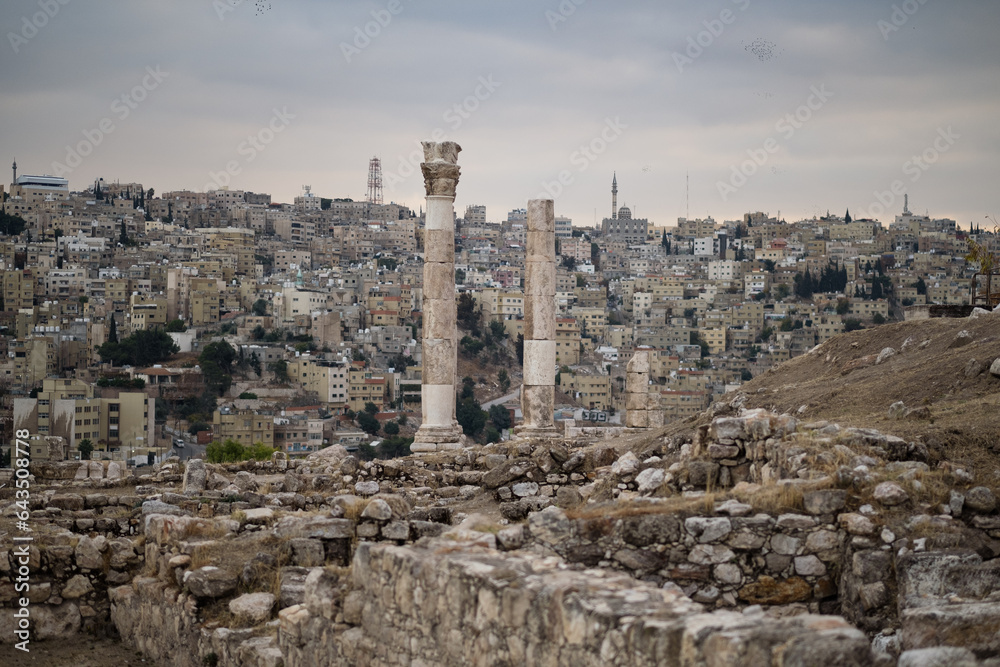Roman ruins stand tall at the Amman Citadel, with the cityscape of ...