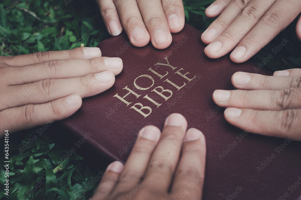 Human hands touching the scriptures. Concept. Belief in God. Living ...