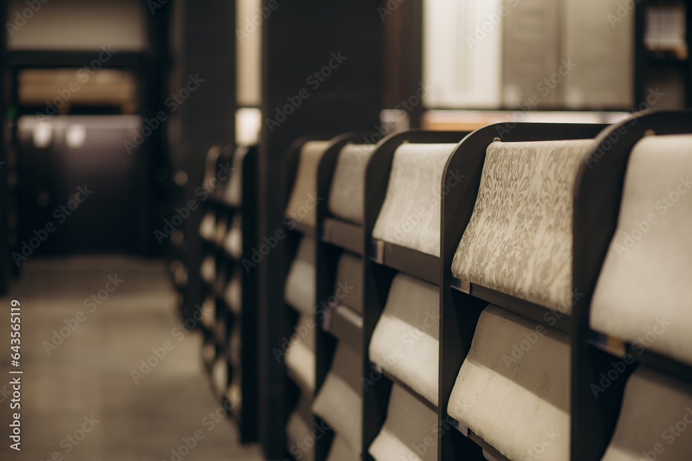 Samples of different wallpapers on store window racks Stock Photo ...