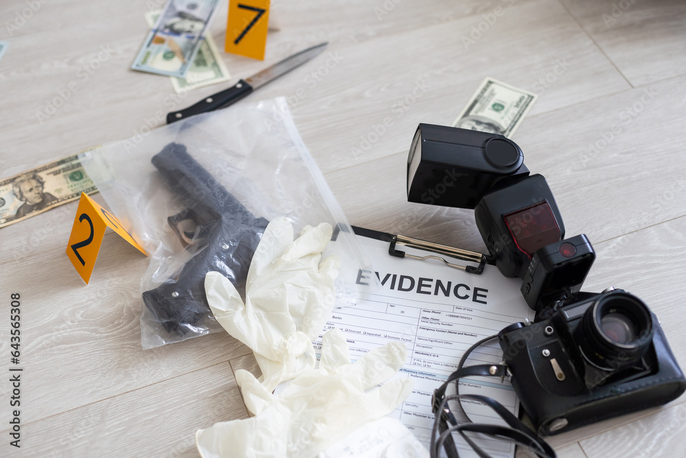 collecting evidence standing behhind yellow crime scene tape Stock ...