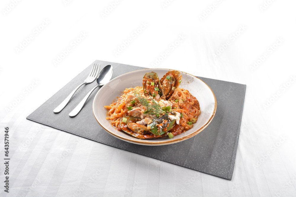 seafood pasta with big tiger prawn, scallop shell clam and muscle in ...