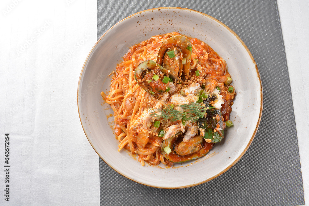 seafood pasta with big tiger prawn, scallop shell clam and muscle in ...