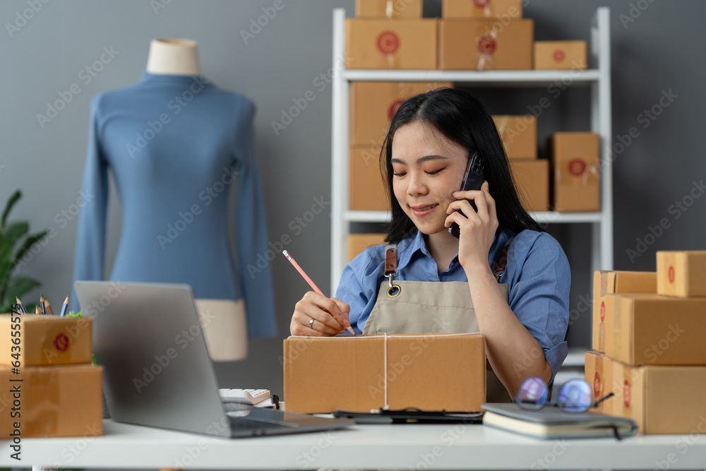 Small business entrepreneur SME freelance woman using phone call ...