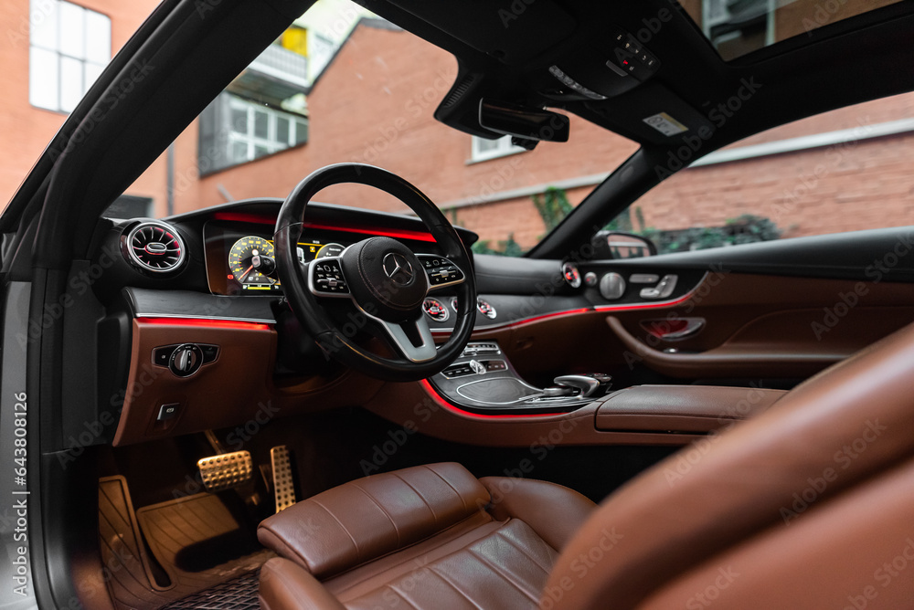 Mercedes-Benz E 200. Interior inside the car. Line of cars from the ...