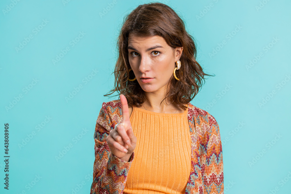 Attractive woman shakes finger and saying No, be careful, scolding and ...