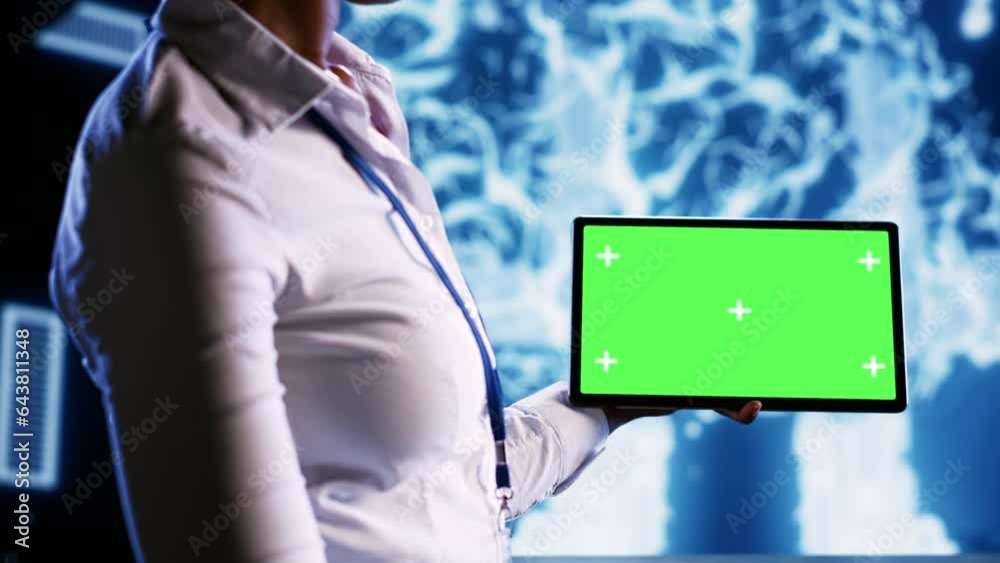 Admin in data center with chroma key tablet using artificial intelligence computing simulating ...