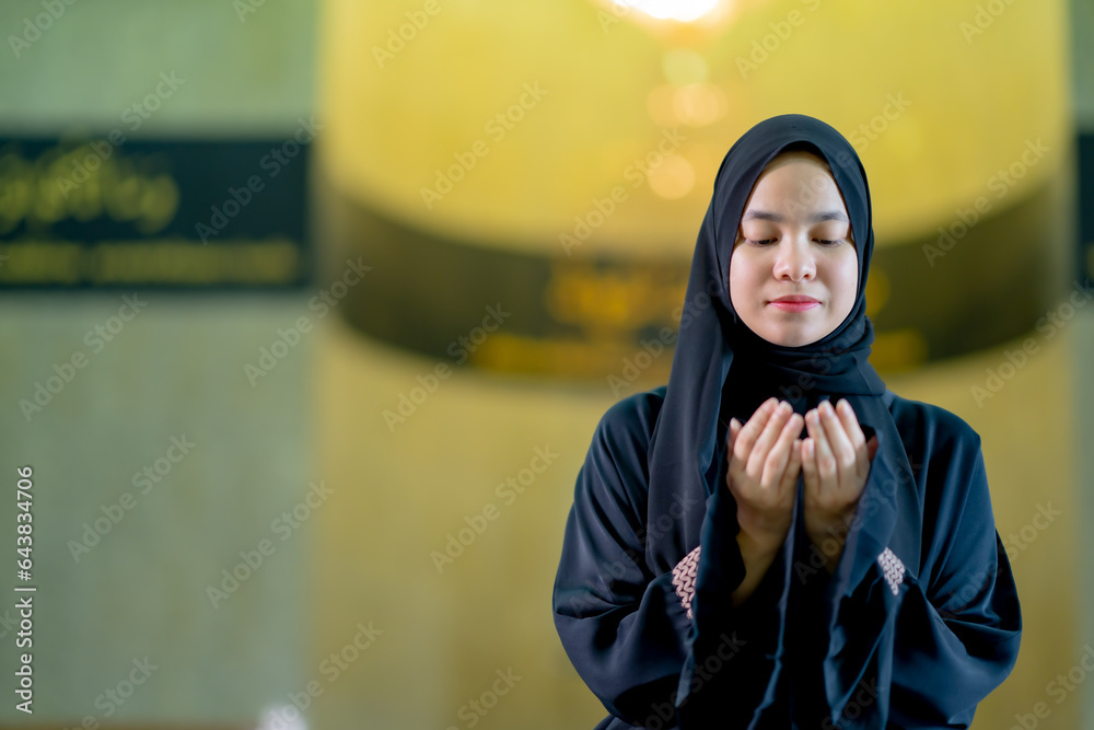 The image of an Asian Muslim woman in the Islamic religion in hijab in ...