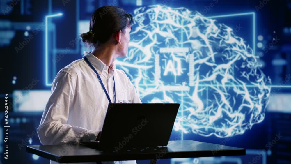 Admin using laptop to visualize artificial intelligence neural networks ...