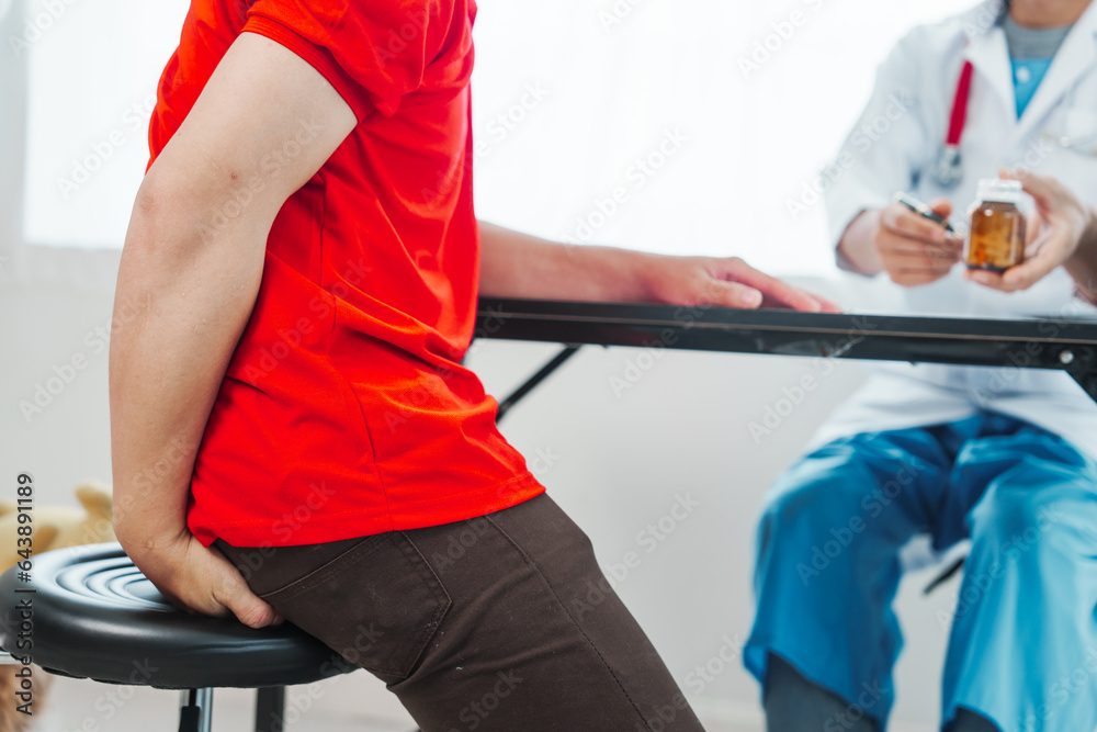 Doctor with patient hemorrhoid care, informed decisions, compassionate ...