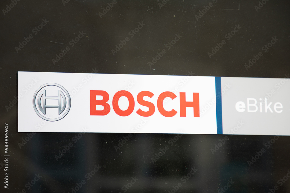 bosch ebike bicycle facility with brand logo shop and text sign for ...