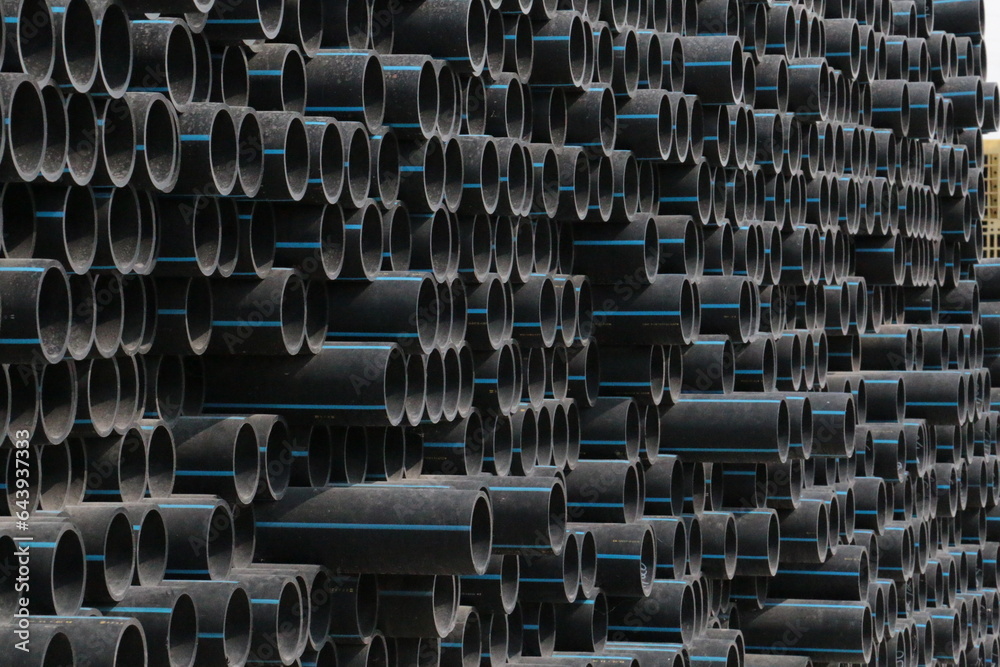 PE pipe plant, Industrial PE pipes with blue line for gas and water ...