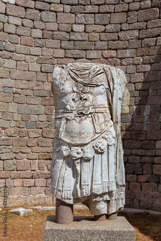 Emperor's armor close-up on an ancient Roman marble statue. Grunge ...