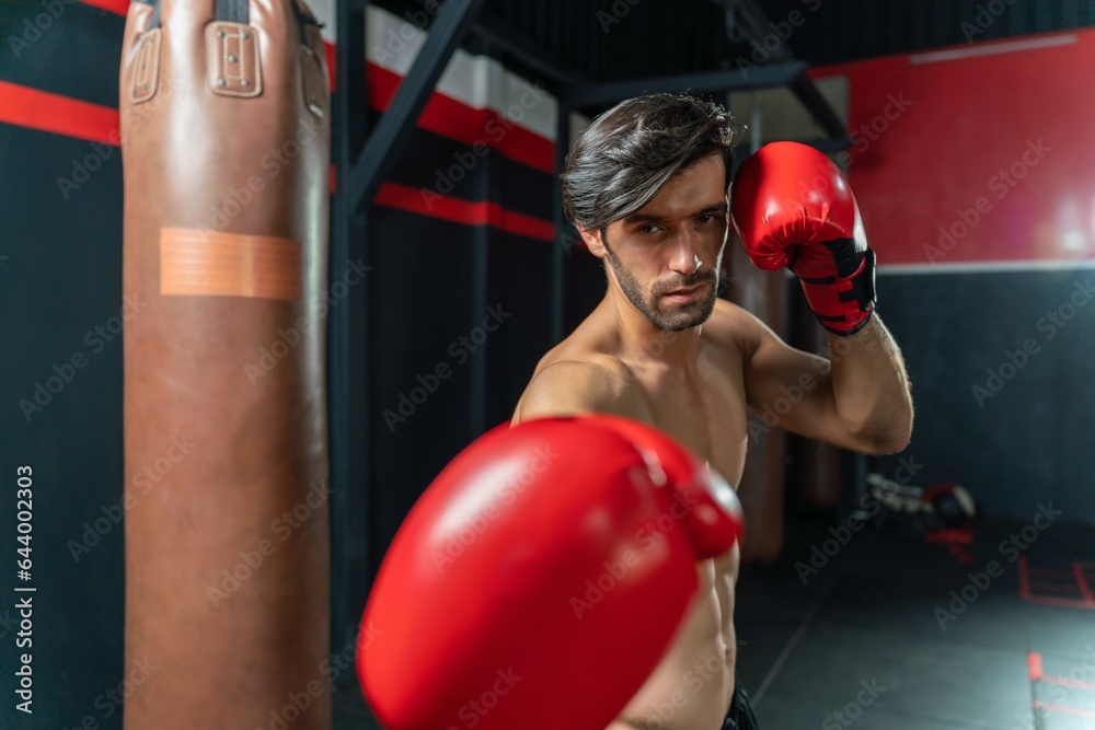 Handsome Middle Eastern man with a muscular body physique showing how ...