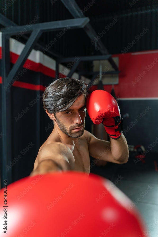 Handsome Middle Eastern man with a muscular body physique showing how ...