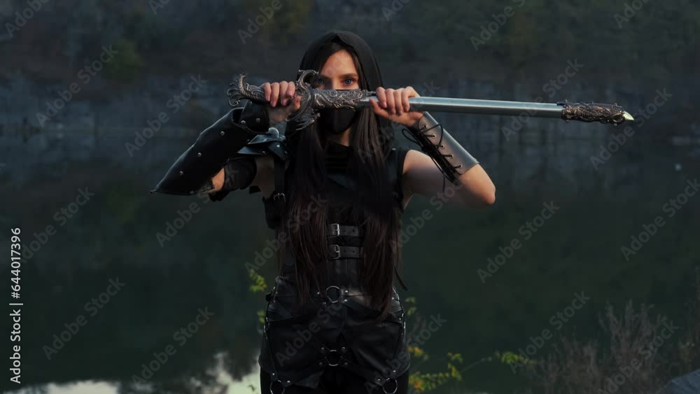 close-up portrait fantasy woman warrior assassin holding dagger in ...