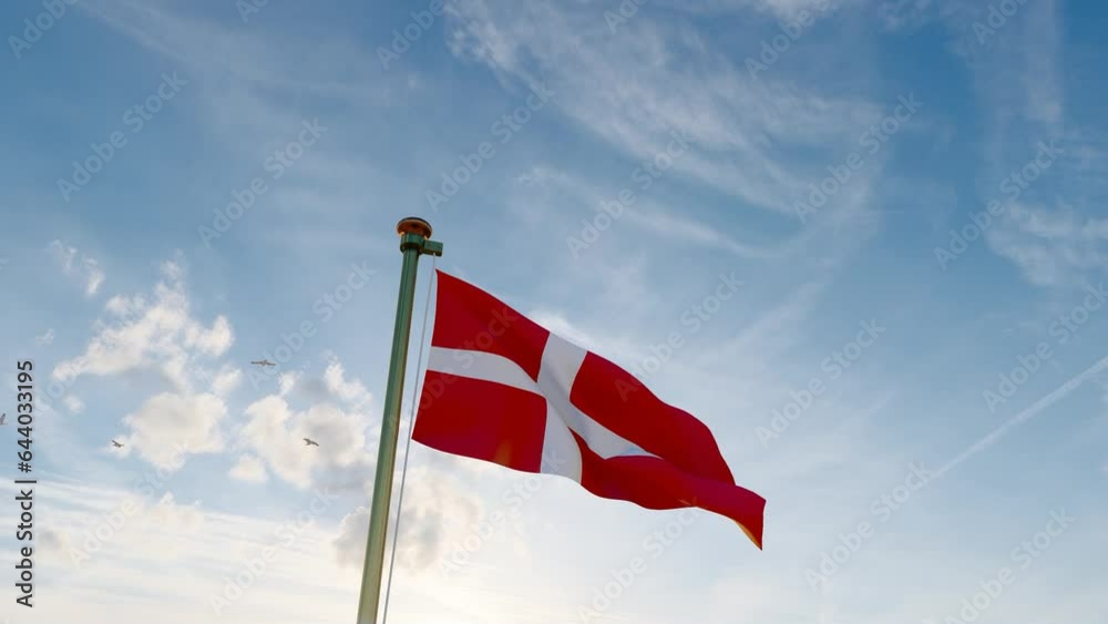 Flag of Denmark waving in the wind, sky and sun background. Denmark ...