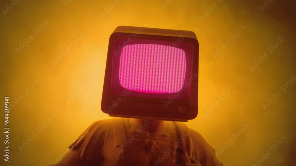 Media magnate. Statue of giant evil god of media with television head ...
