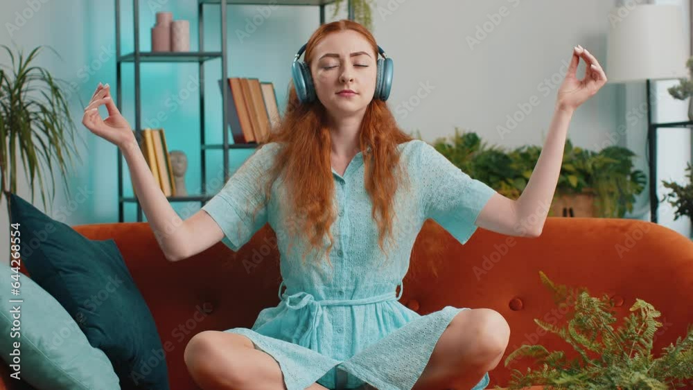 Keep calm down, relax, inner balance. Redhead woman breathes deeply ...