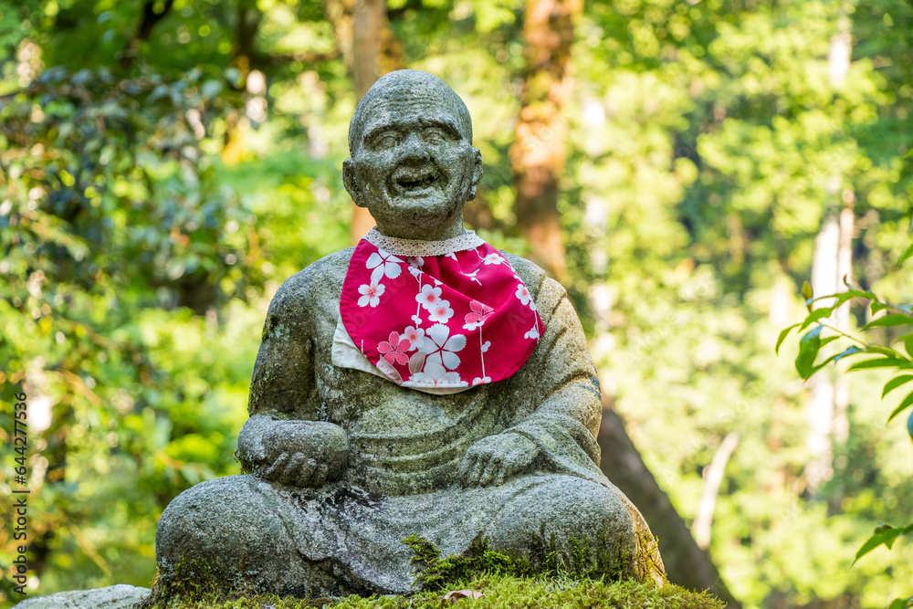 Jizo statuary is a stone guardian statue according to Japanese beliefs ...