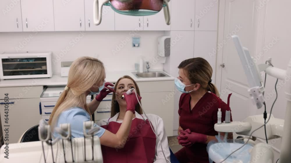 Dental checkup, dental check, mouth checkup. With intraoral camera ...