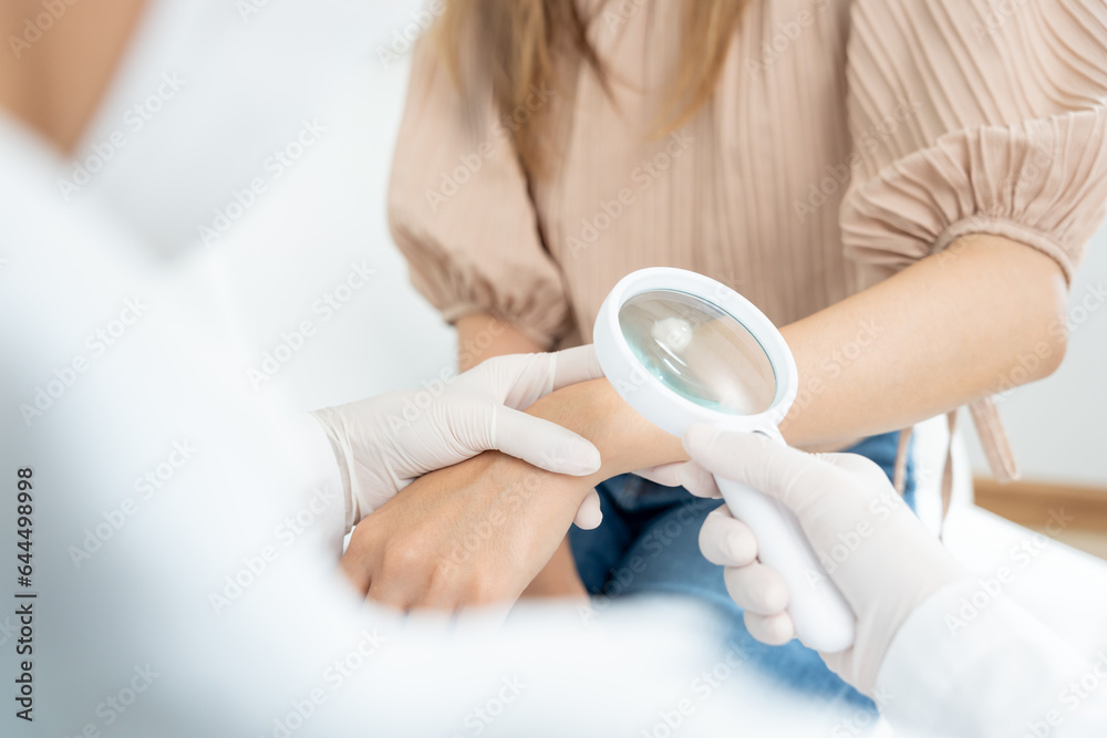 skin problem and beauty of asian girl. Dermatologist use magnifying ...