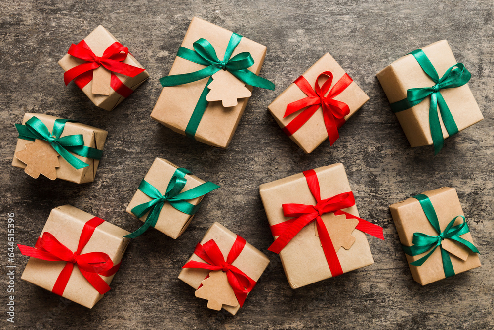 Colored craft gift boxes with colorful ribbons on colored background ...