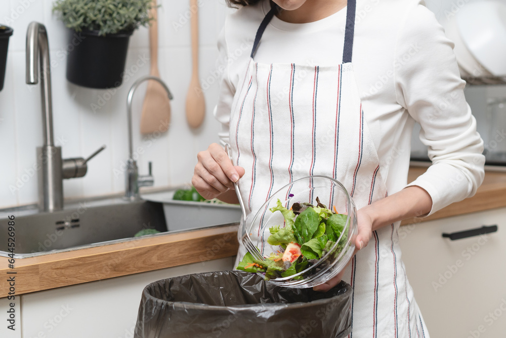 Food waste environment concept, people throwing food garbage into bin ...