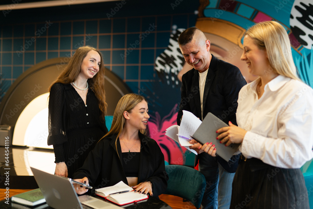 Team gathers to play virtual team challenges for fun. Employees solve ...