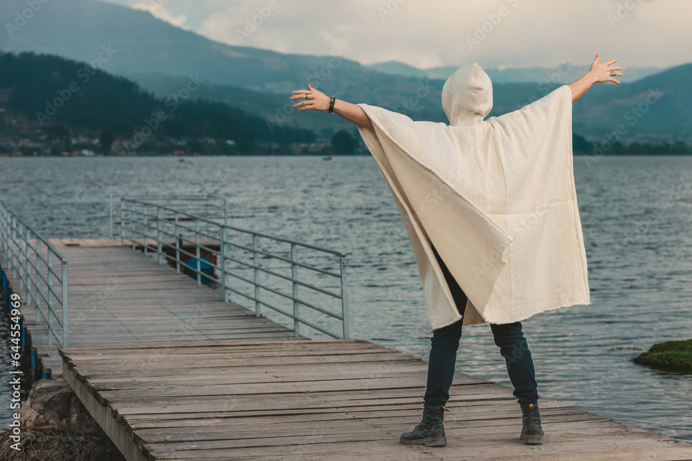 Model wearing a poncho handmade with sheep cloth by the indigenous ...