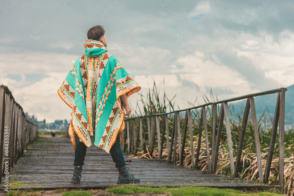 Model wearing a poncho handmade with sheep cloth by the indigenous ...