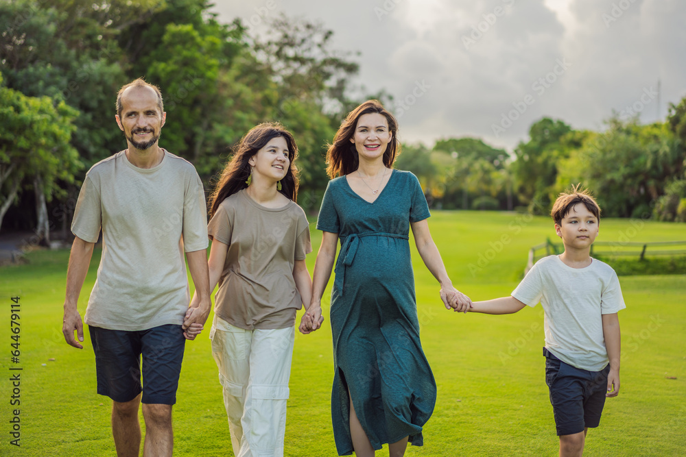A loving family enjoying a leisurely walk in the park - a radiant ...
