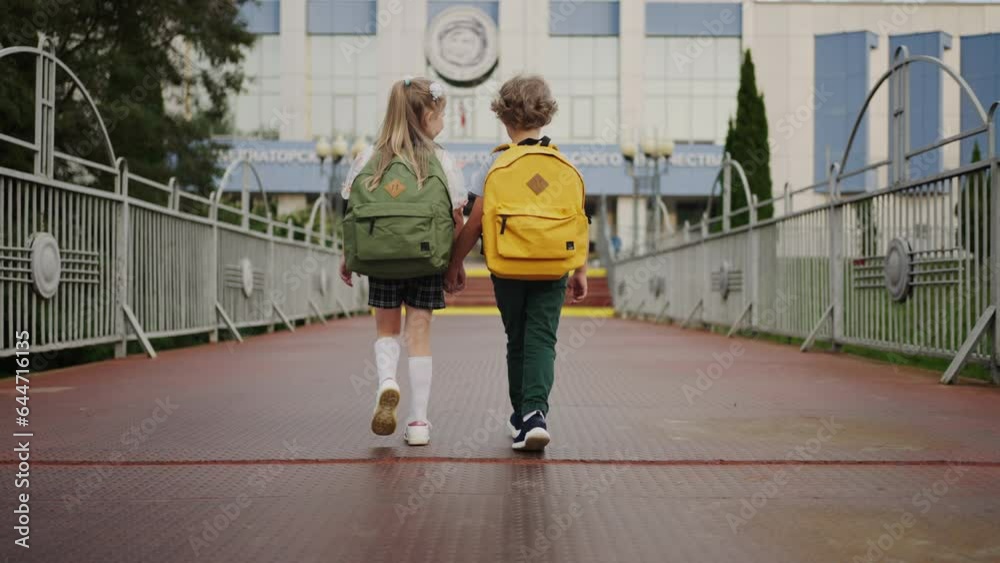 School Children Go To School, Back View Of Schoolboy And Schoolgirl ...