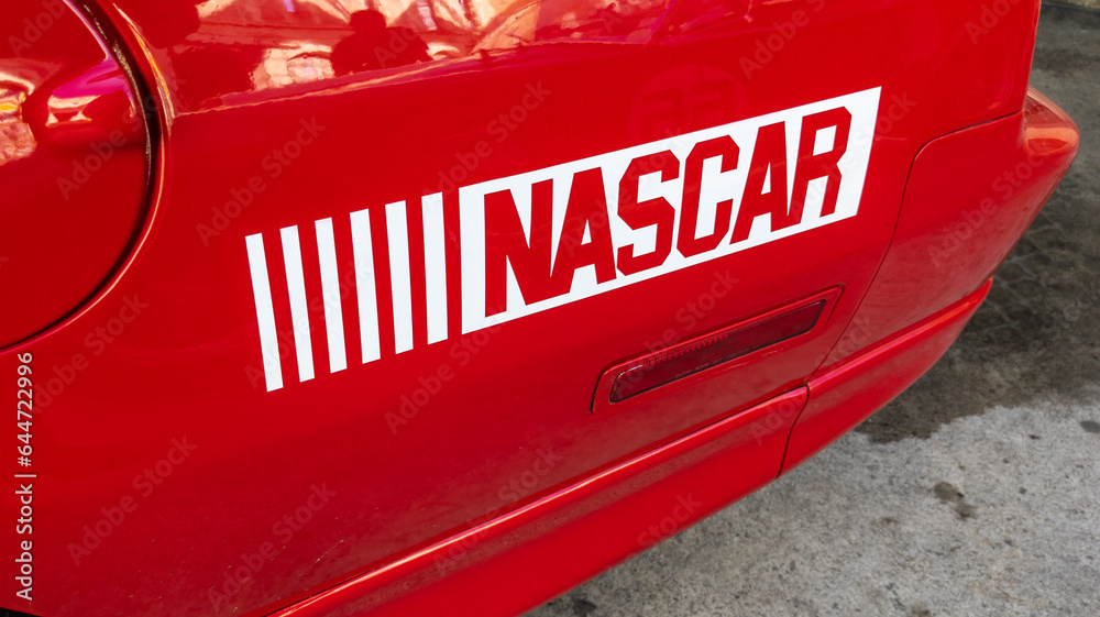 nascar logo brand and text sign on side racing sport car in circuit for ...