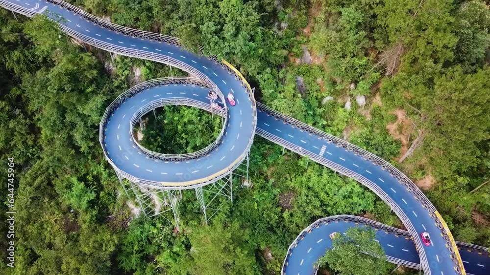Aerial drone shot of curved Kart Race Track in theme Park, Tonglu ...