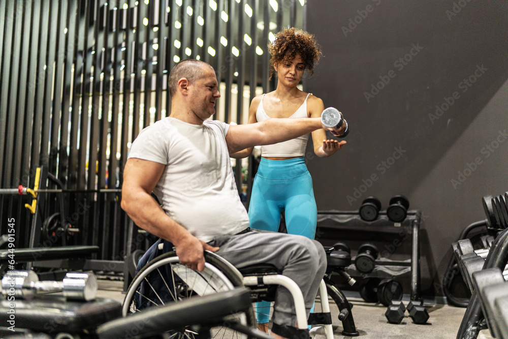 In a display of strength and inclusivity, a person in a wheelchair ...