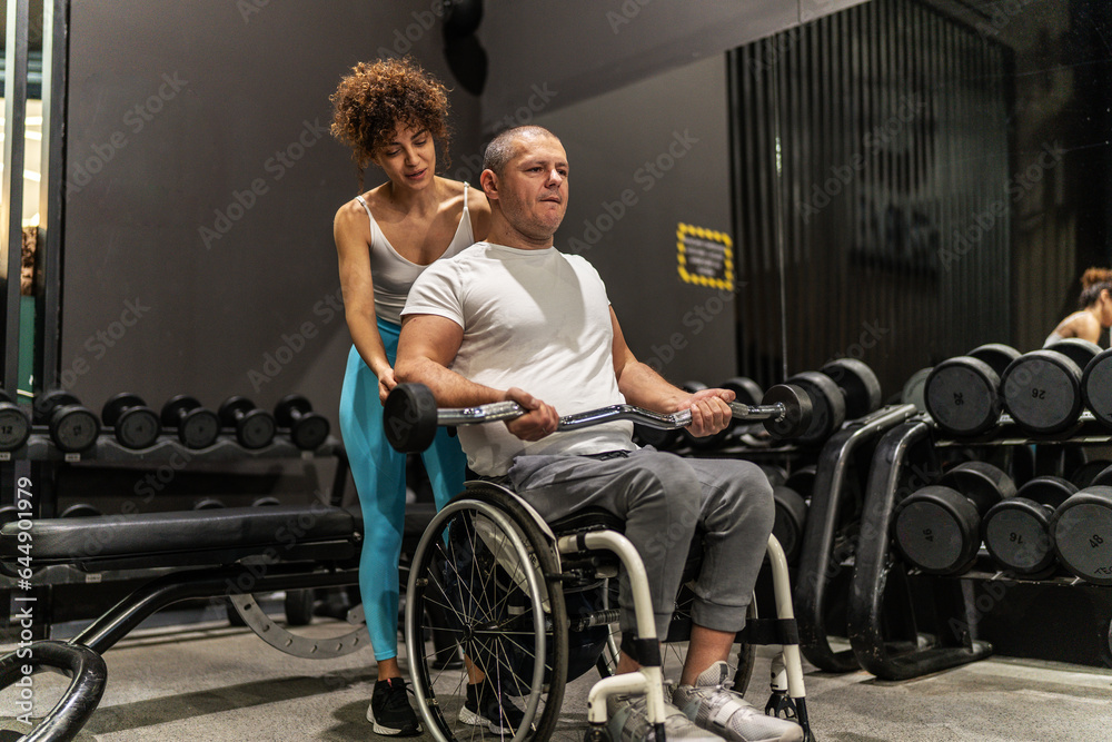 In a display of strength and inclusivity, a person in a wheelchair ...