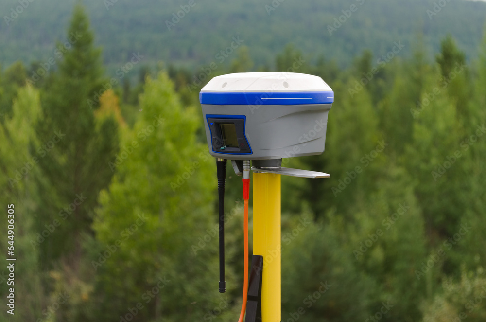 GNSS base station receiver running RTK mode at quiet and tranquil place ...