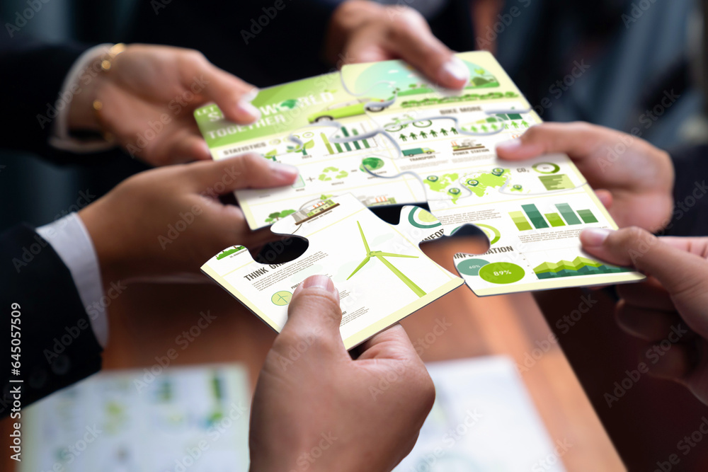 Cohesive group of business people forming jigsaw puzzle pieces in ...