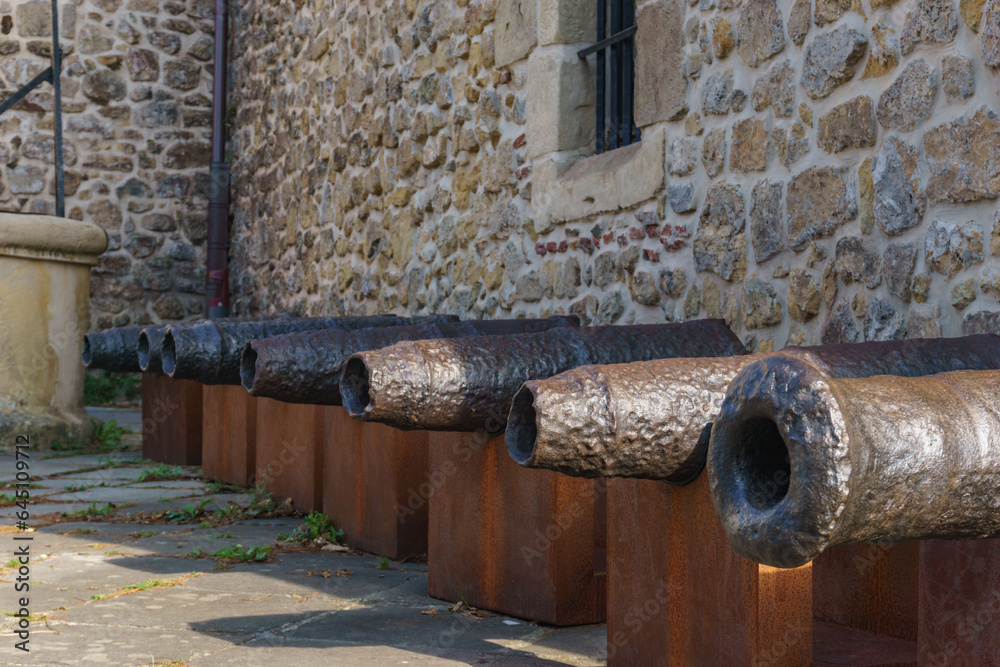 Antique cannon artillery defensive weapon at historic fort building ...