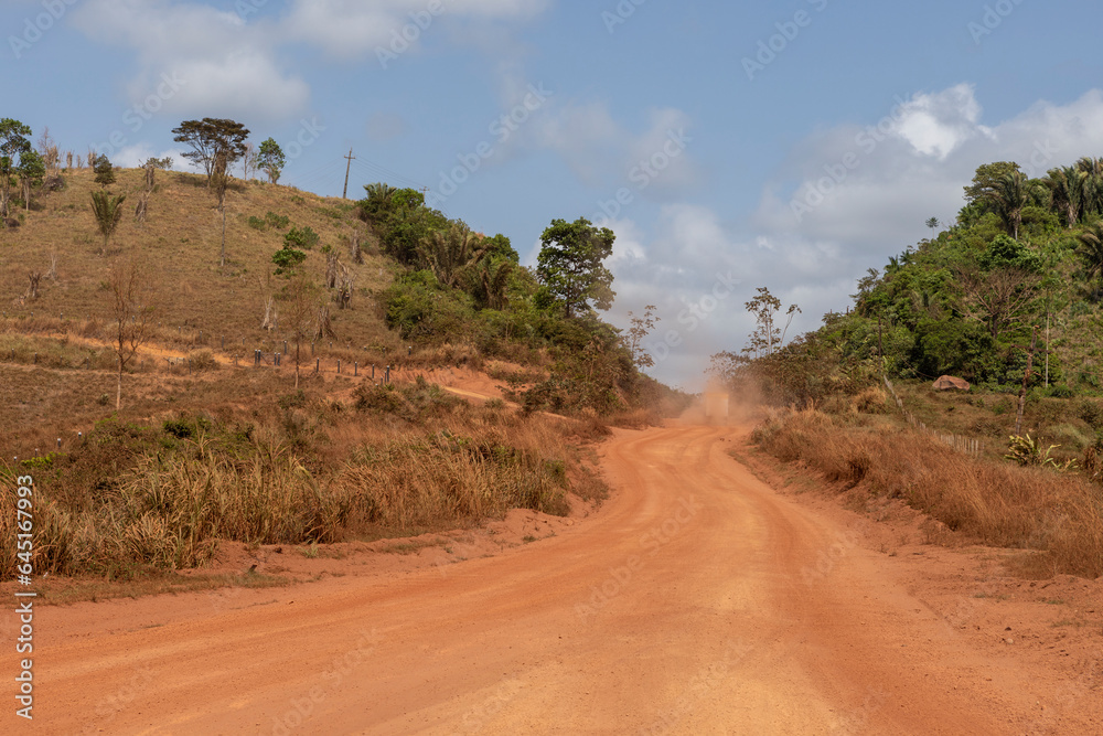 Driving on the famous earth road Transamazonica towards Santarém ...