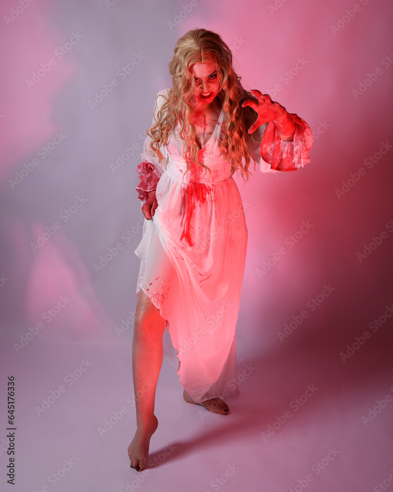 Full length portrait scary vampire zombie bride wearing bloody ...