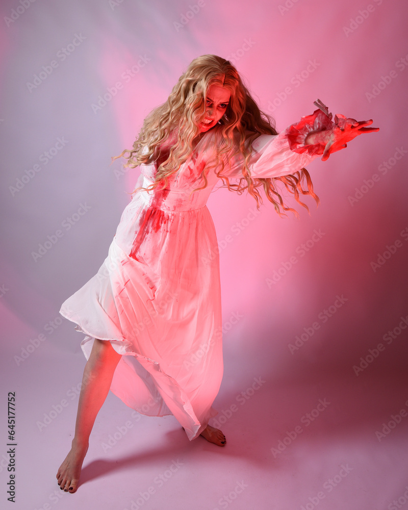 Full length portrait scary vampire zombie bride wearing bloody ...