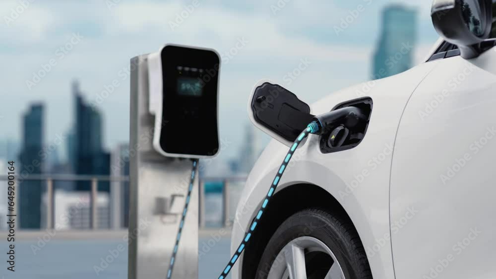 Electric car plug in with charging station to recharge battery by EV ...