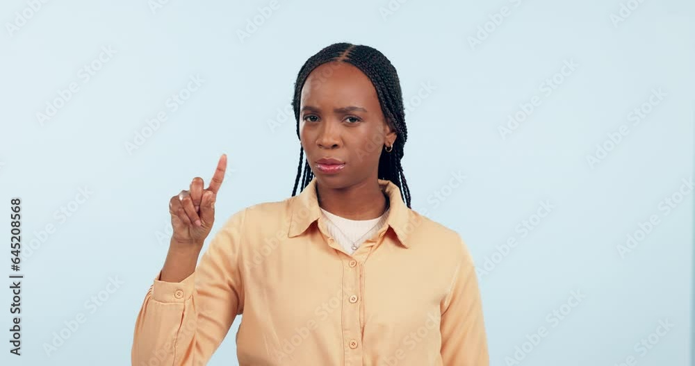 No, finger and face of woman in studio with head shake for stop, wrong ...