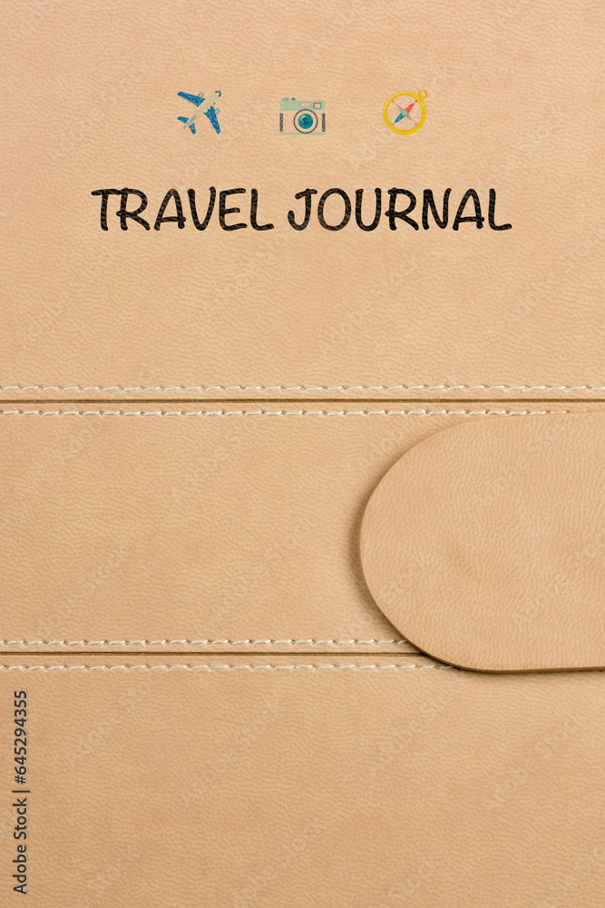 close-up of a travel journal cover featuring three small logos: a plane ...