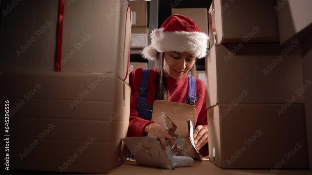 employee inside distribution warehouse has bad, damage, broken or ...