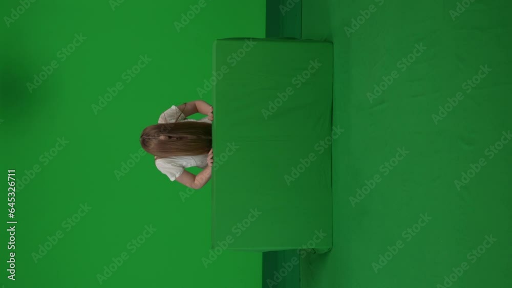 Full-size vertical green screen chroma key video of a posessed female ...